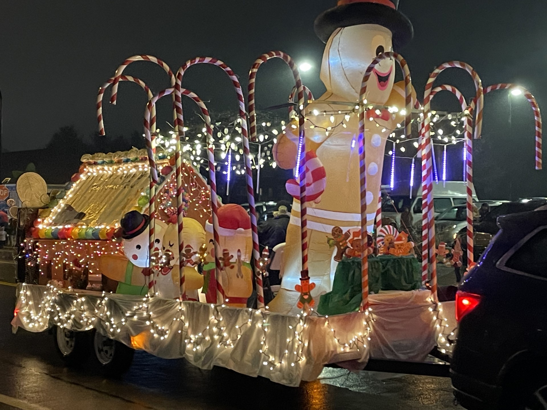 Solid, Cheerful Crowd at Night of Lights Parade Despite Rainy Weather ...